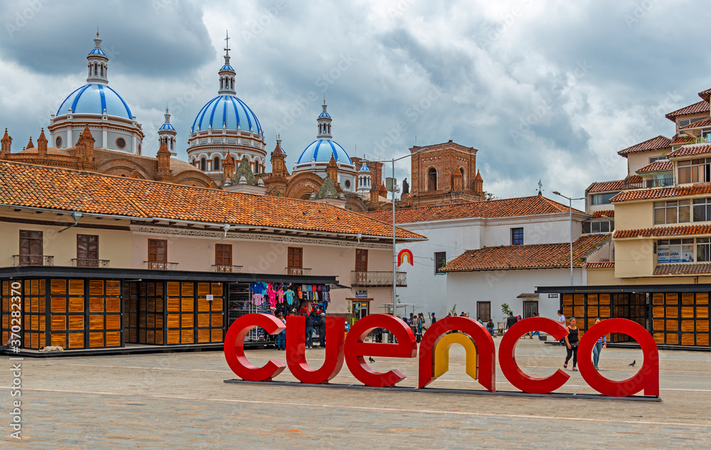 Cityscape with symbol sign of Cuenca city on San Francisco square with ...