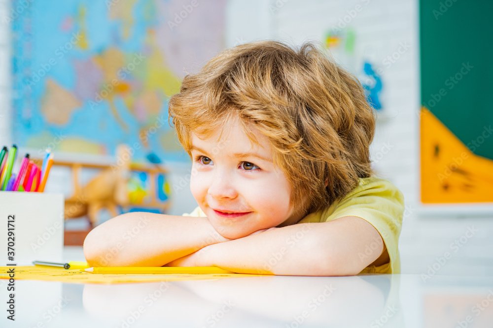 Happy school kids at lesson. Kid gets ready for school. Cute pupil with ...