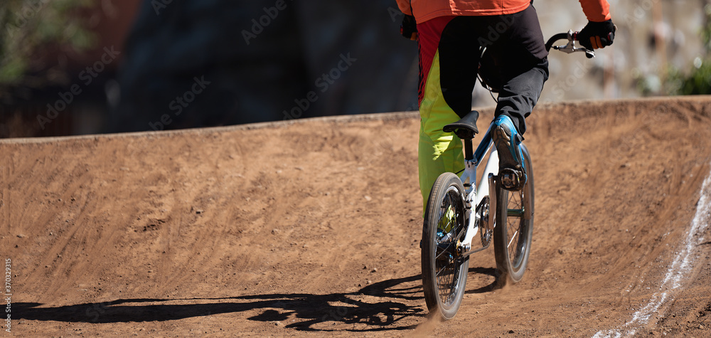 BMX rider competing in the child class on the off-road circuit Stock ...