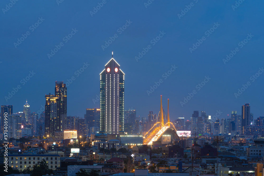 Rama 9 bridge and Kasikorn Building, with skyscraper high rise buildings in urban city, Downtown ...