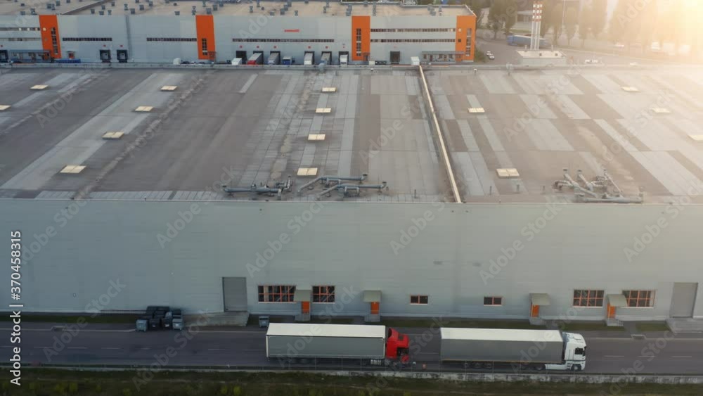 Big logistics park, loading hub. Semi trucks with cargo trailers ...