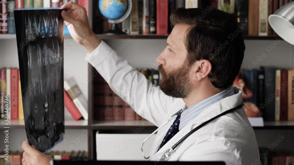 Concept is good MRI scan, good diagnosis. Male doctor white coat at ...