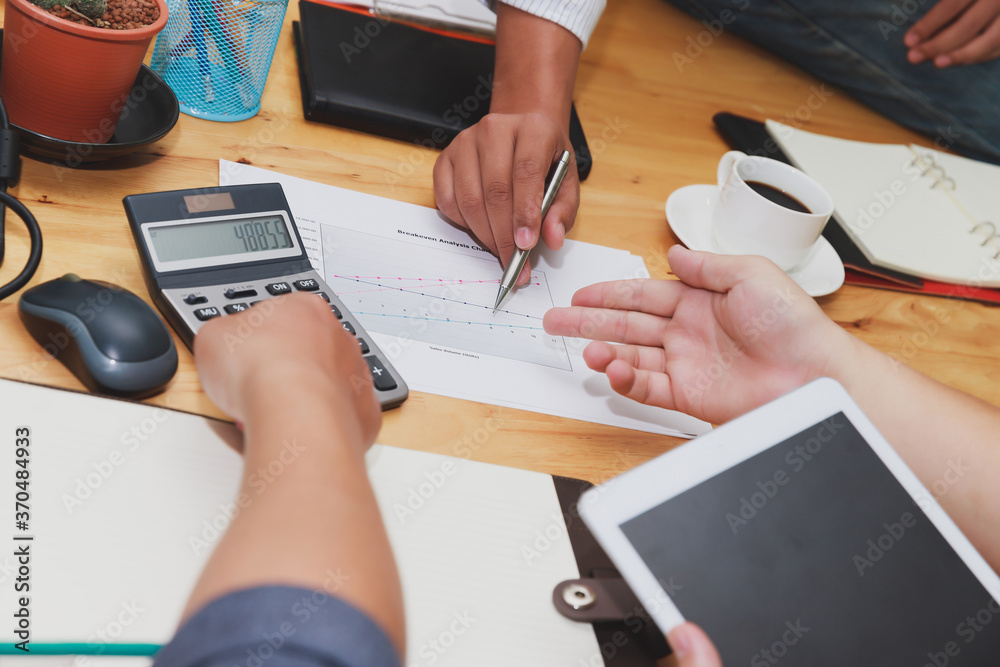 Business team meeting and discussing project plan. Businessmen ...