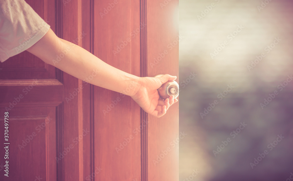 Women hand open door knob or opening the door,grand opening,Close up ...
