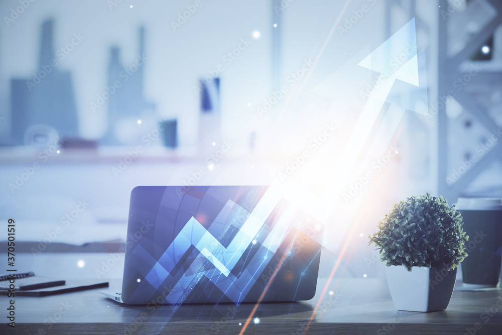 Computer on desktop with point up arrows hologram. Double exposure ...