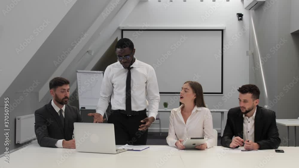 Dark-skinned African-American talks about a new project at the ...