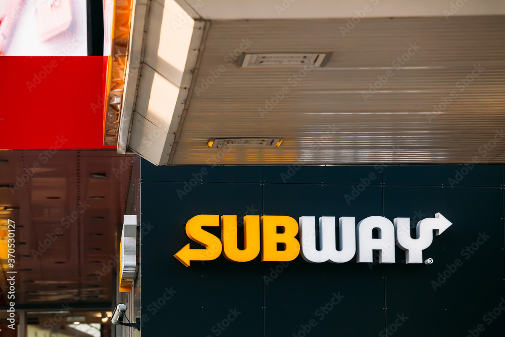 Logo Sign Brand of Subway On Wall Of Fast Food Restaurant Stock Photo ...