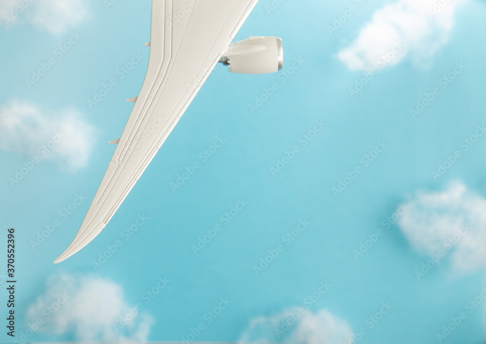 Airplane wing flying travel concept. Flat shot of an aeroplane wing on ...