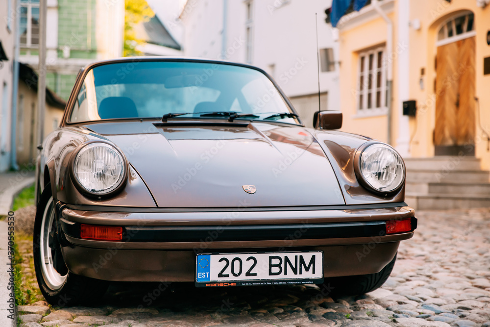 Front View Of Porsche 930 Car Parked In Old Narrow Street. Stock Photo ...