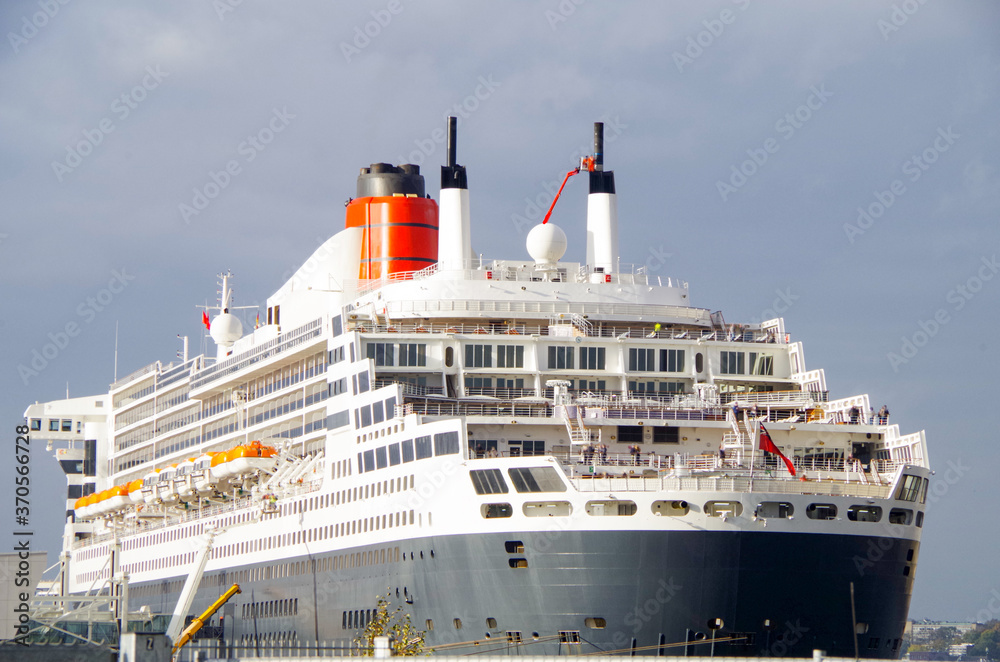 Rear view of stern and superstructure with red funnel of legendary ...