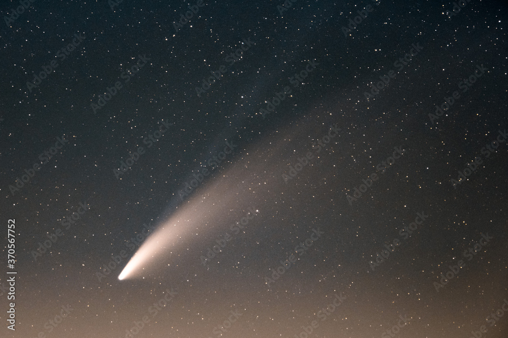 Neowise Comet and its long dust tail after dusk from Etna volcano Stock ...
