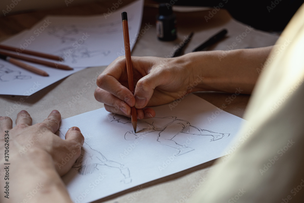 Drawing, sketching the human figure with a pencil Stock Photo | Adobe Stock