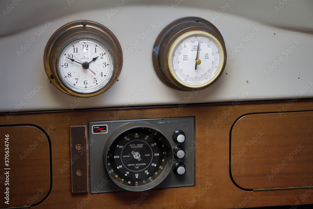 Nautical yacht cockpit. Close-up of a motorboat control panel with ...
