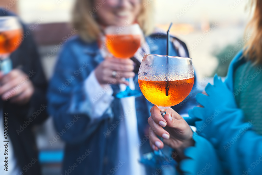Row line of red colored negroni and spritz aperitif alcohol cocktails ...