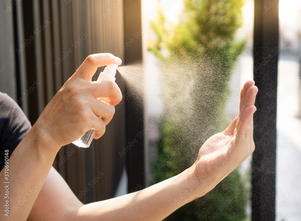 Asian office men clean their hands with alcohol-based hand washing ...