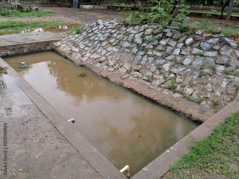 rain water harvesting pond or tank Stock Photo | Adobe Stock