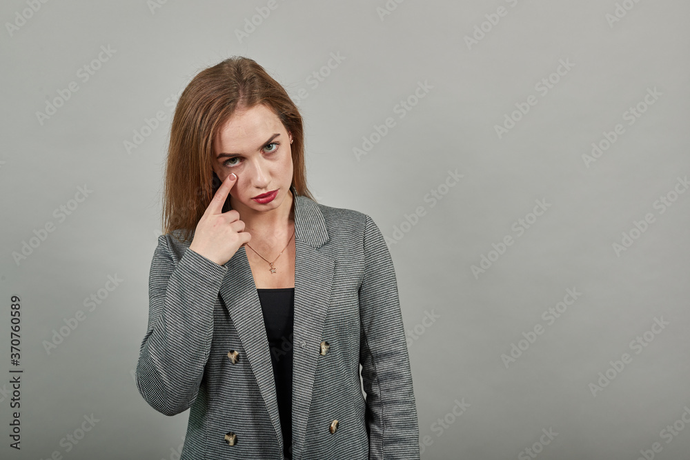 Contact lens on index finger, pointing to eye with hand, thinking ...