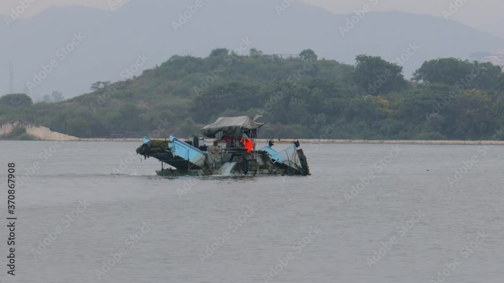 Ship purifies water and collects trash and algae from the water ...