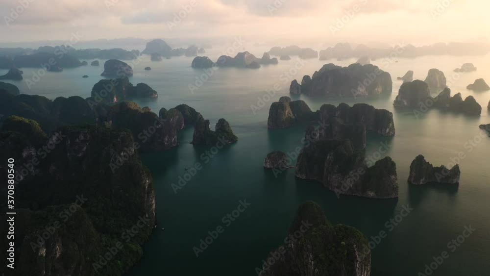 Cinematic Aerial View of Ha Long Bay Archipelago Under Sunset Sunlight ...