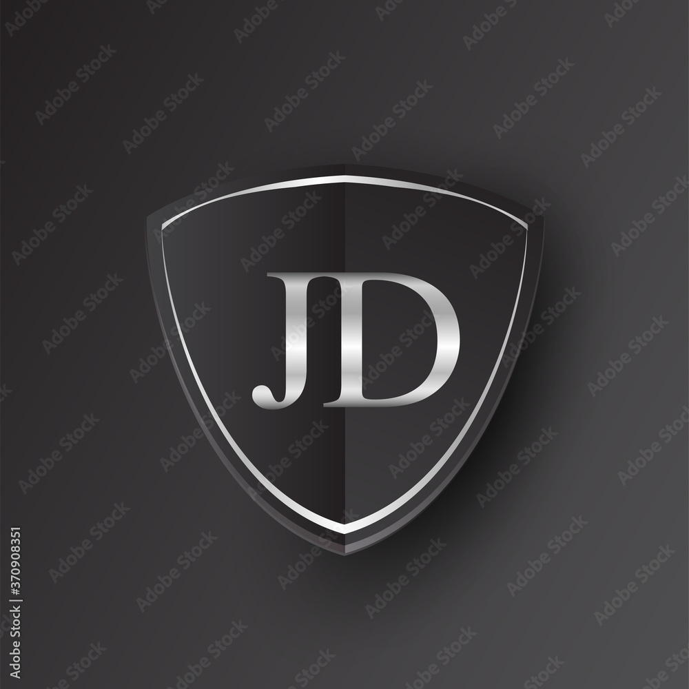 Initial logo letter JD with shield Icon silver color isolated on black ...