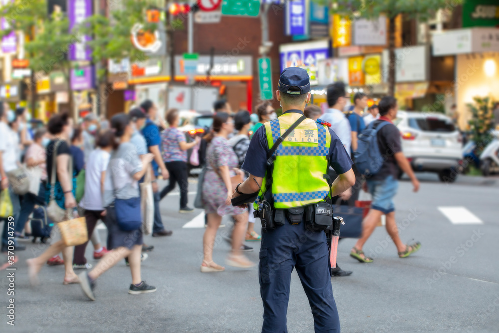 The police patrolling at the crossroads to guard the safety of the ...