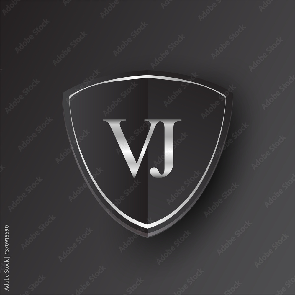 Initial logo letter VJ with shield Icon silver color isolated on black ...
