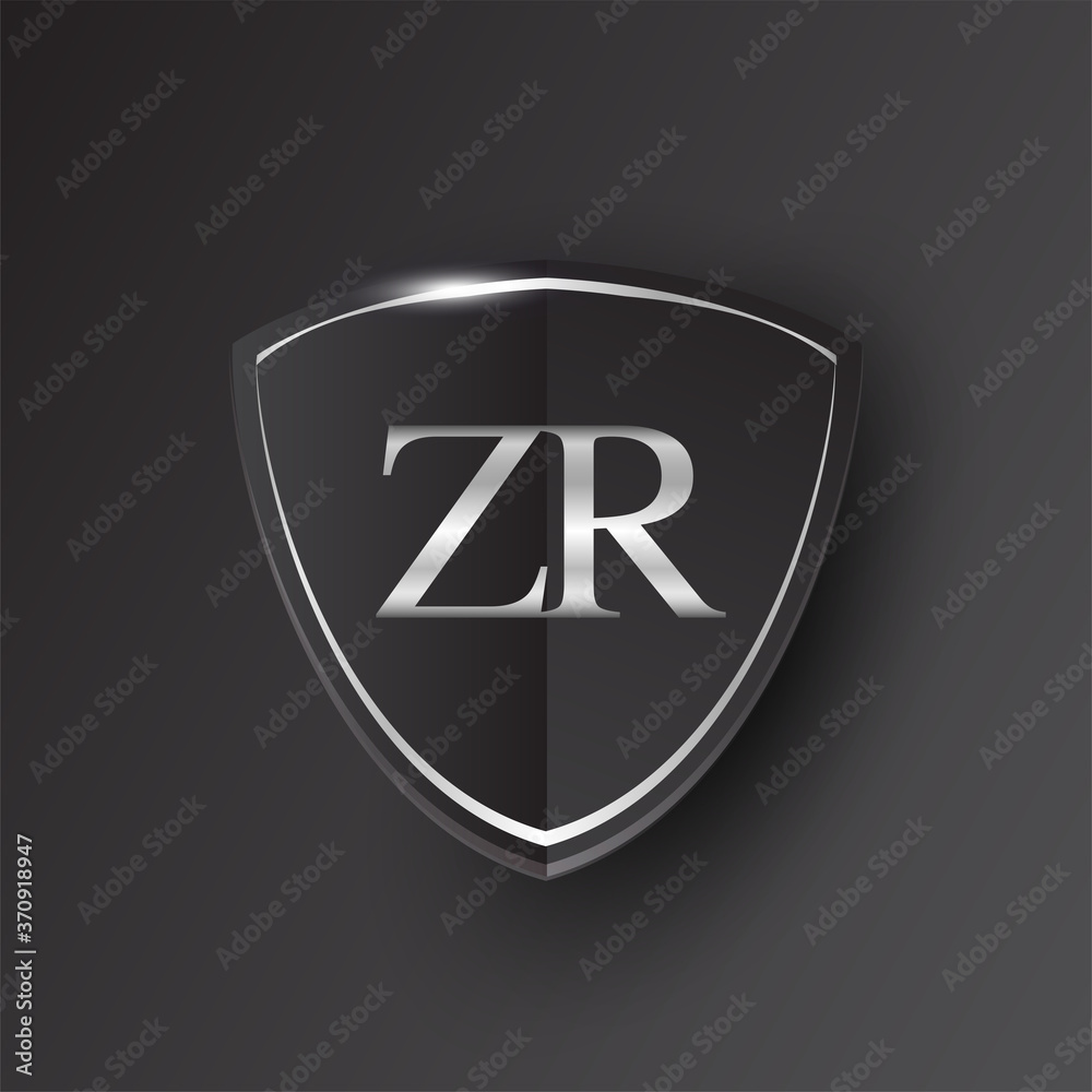 Initial logo letter ZR with shield Icon silver color isolated on black ...