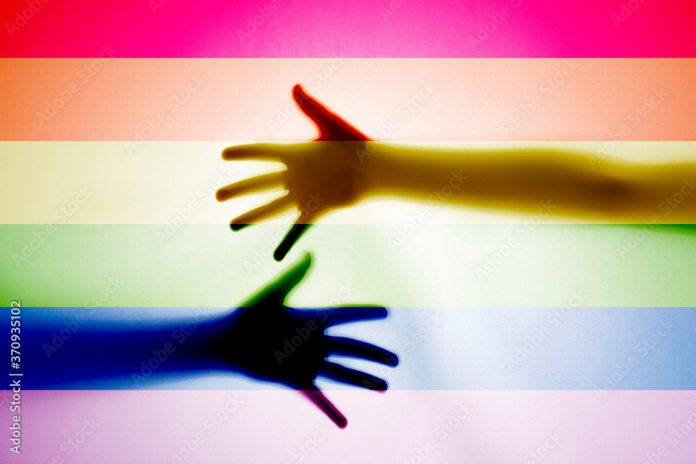 LGBT support, hands and rainbow colors spectrum flag - pride flag LGBT ...