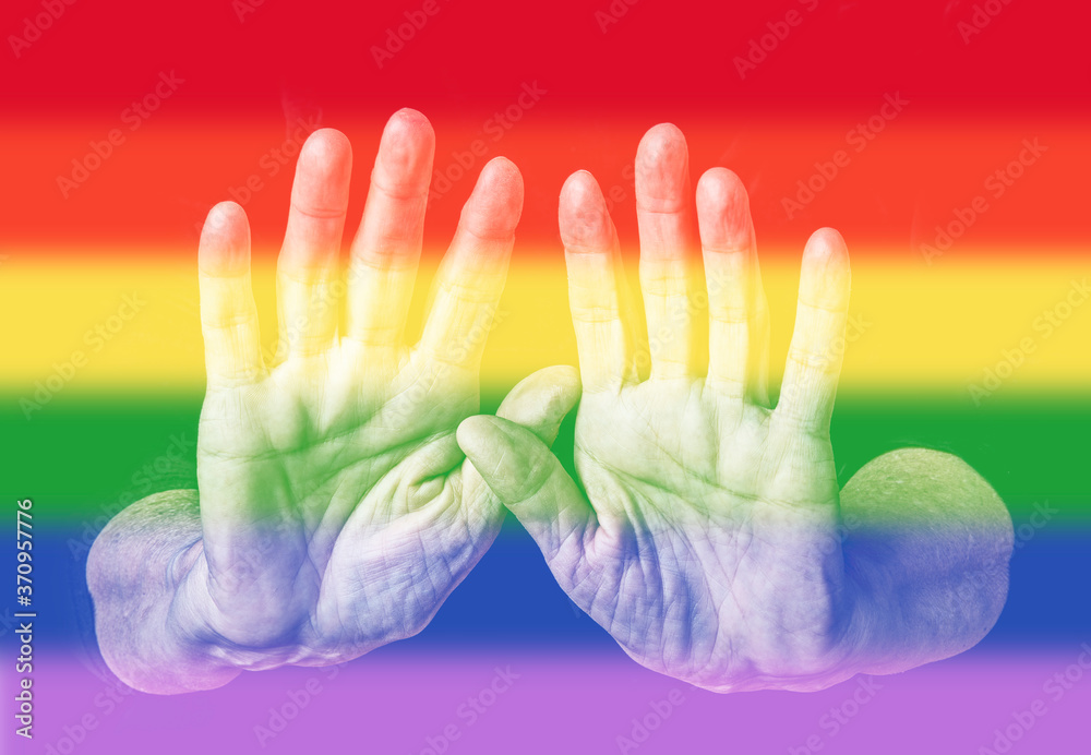 LGBT support, hands and rainbow colors spectrum flag - pride flag LGBT ...