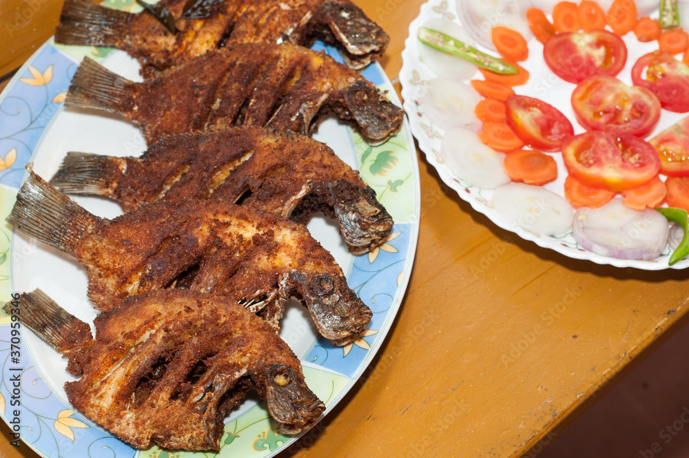 Kerala Fish fry India. fresh seafood curry served in house boat of ...