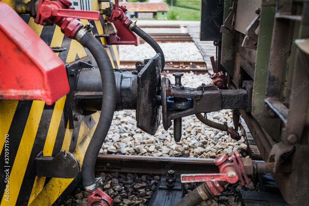 Linking old train wagons at railway station, old train coupling Stock ...