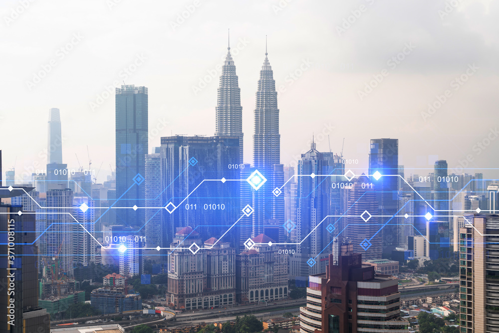Technology hologram over panorama city view of Kuala Lumpur. KL is the ...