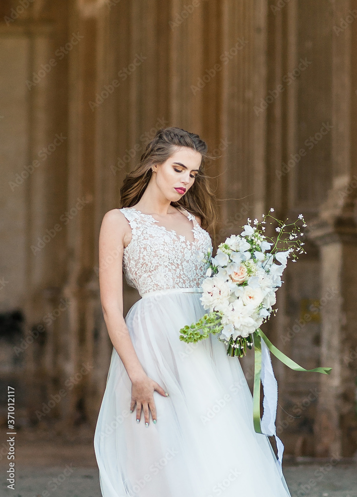 Beauty fashion bride with flowers posing . Beautiful Bride portrait ...
