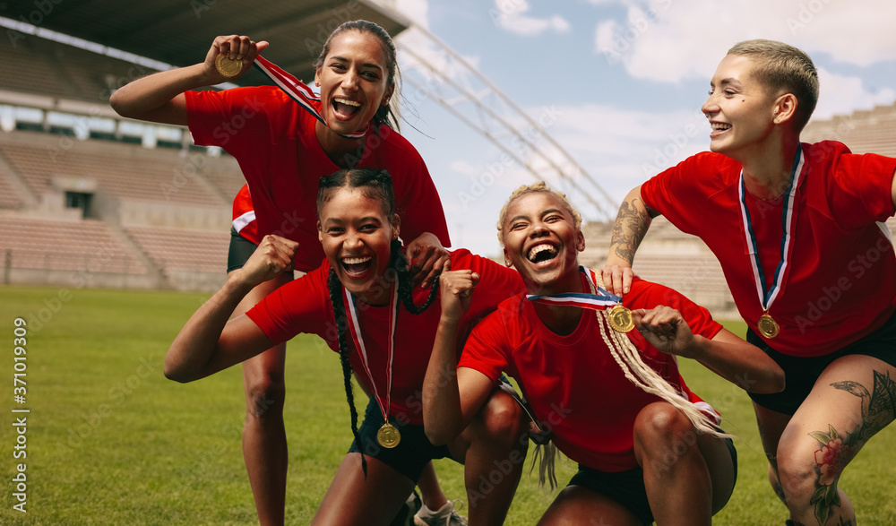 Female soccer team cheering together after the game league Stock Photo ...