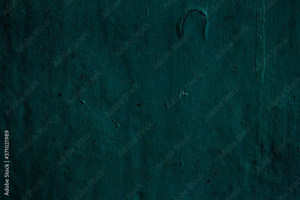 Petrol colored wall texture background with textures of different ...