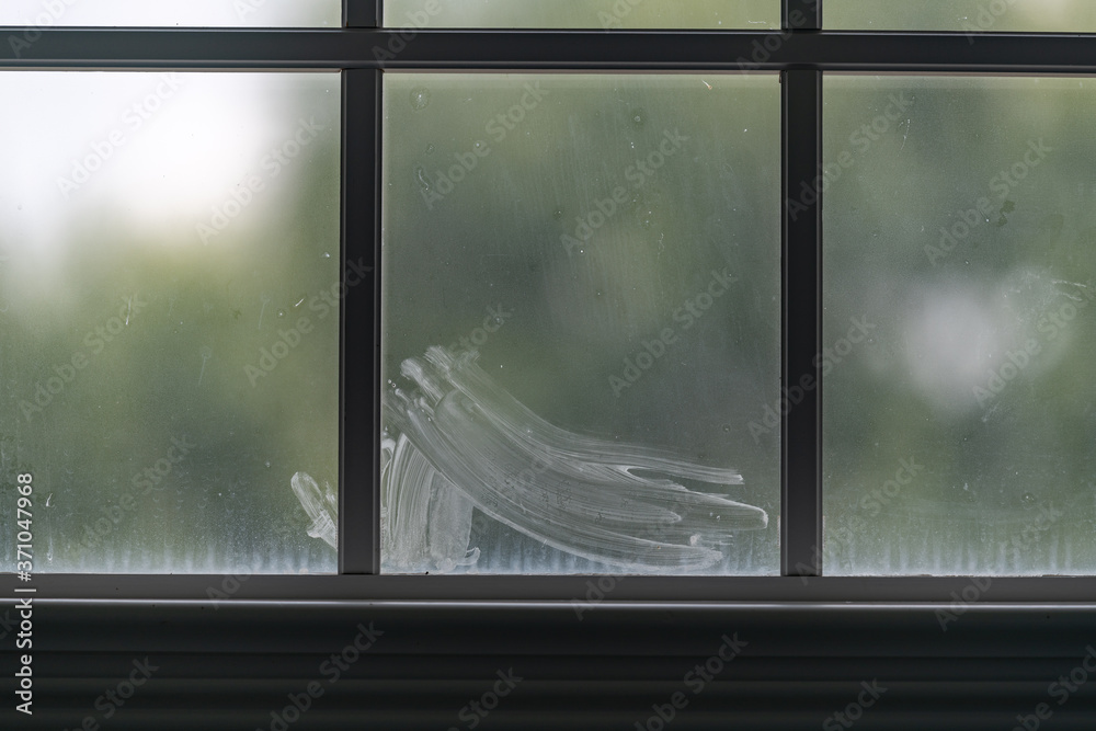 Window with paint smear and a shallow depth of field background Stock ...