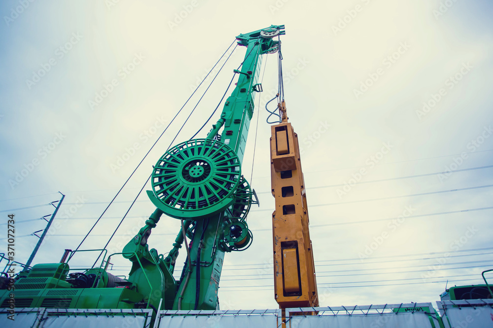 Pile crane. Construction cranes. Large construction cranes. Drilling ...