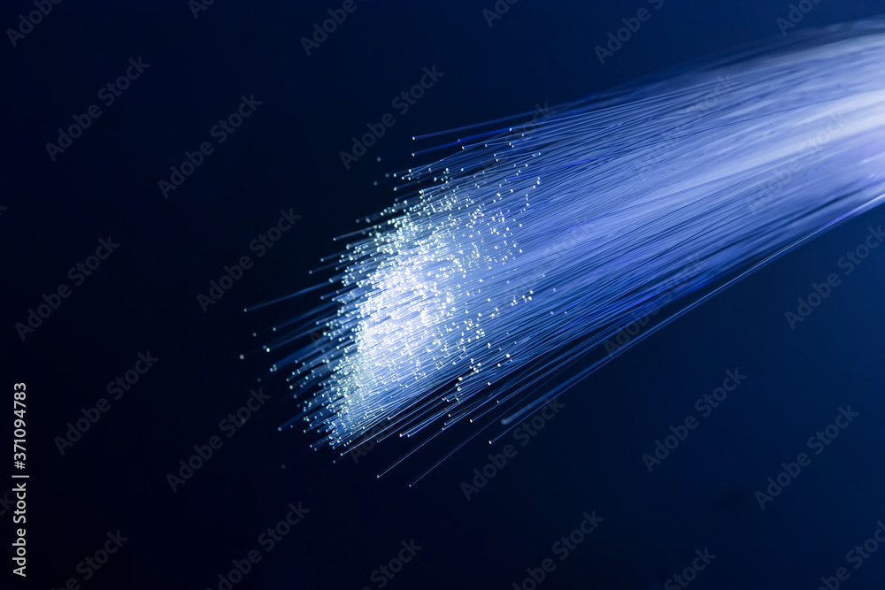 colorful optical fibres dinamic flying from deep on technology ...