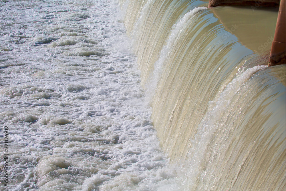 Water spills over the top of Silifke Dam on the Goksu River Stock Photo ...