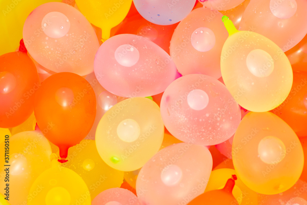 Colorful balloons filled with water. Texture of colorful balloons ...