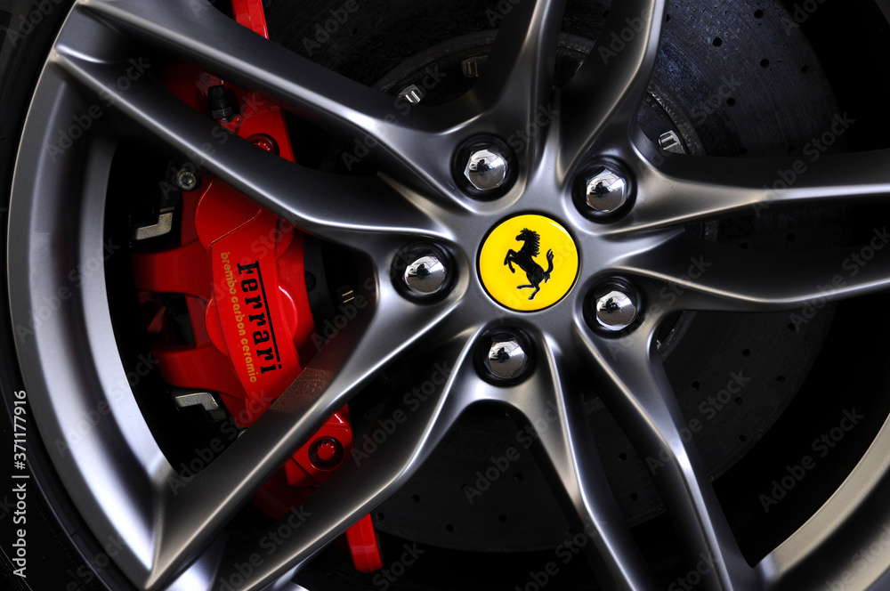 Close-up of a wheel of a Ferrari sports car in the Mugello Circuit ...