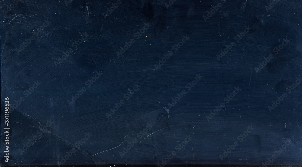 Broken glass background. Dirty wind screen. Dark blue laptop display ...