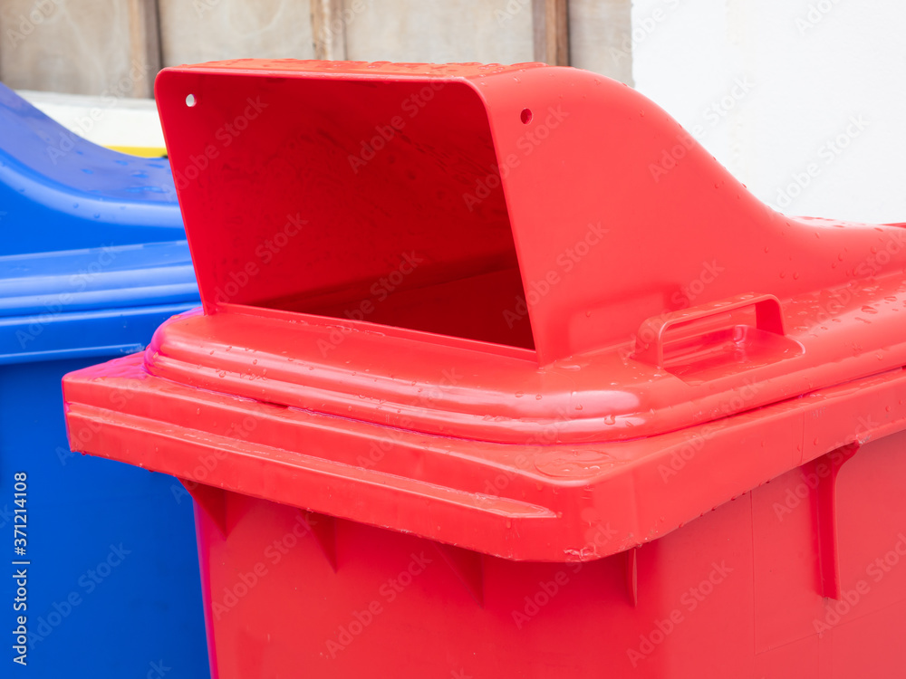 Red recycle garbage trash Bins at Sidewalk. Old Recycling Garbage for ...