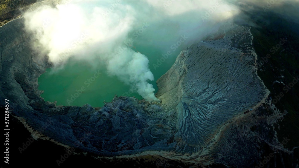 The top view inside a volcano which is erupting in the Java island in ...