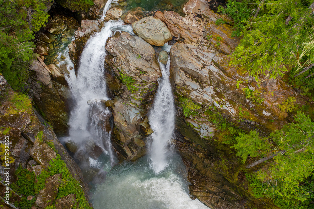 Aerial Drone View Of Nooksack Falls, Washington. Nooksack Falls is one of the most popular ...