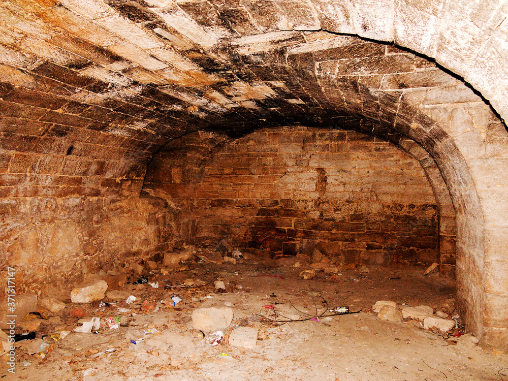 Mystic interior of an ancient dungeon. An old abandoned tunnel in an ...