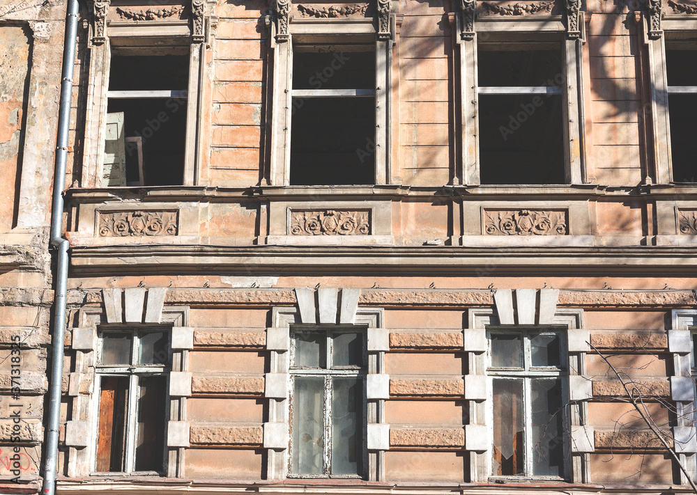 Windows of the old abandoned high-rise buildings in the city centre on ...