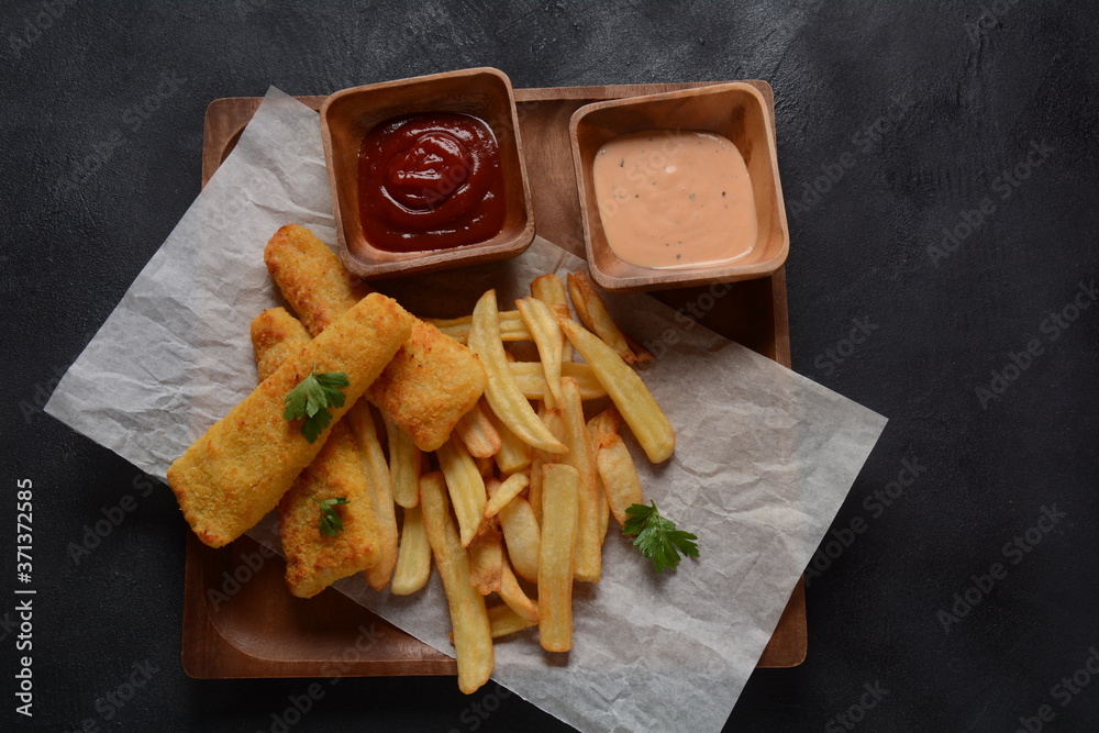 Traditional English Food - Fish and Chips. Fried fish filets and crispy ...