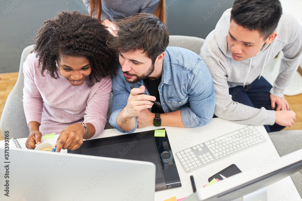 Web design team develops a design idea Stock Photo | Adobe Stock