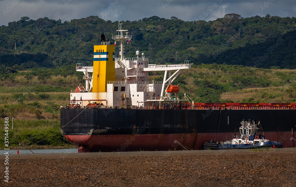 Tanker ship in the Panama Canal. Large crude oil tanker crossing the ...